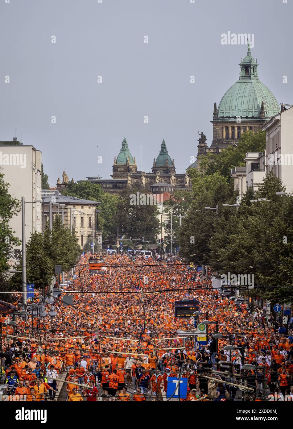 LEIPZIG - Dutch fans walk behind the Oranjebus during the fan walk to ...
