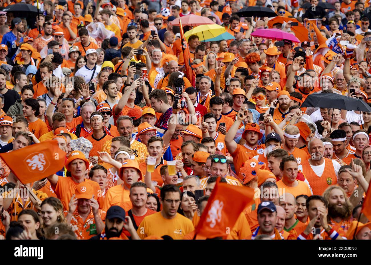 LEIPZIG - Dutch fans walk behind the Oranjebus during the fan walk to ...