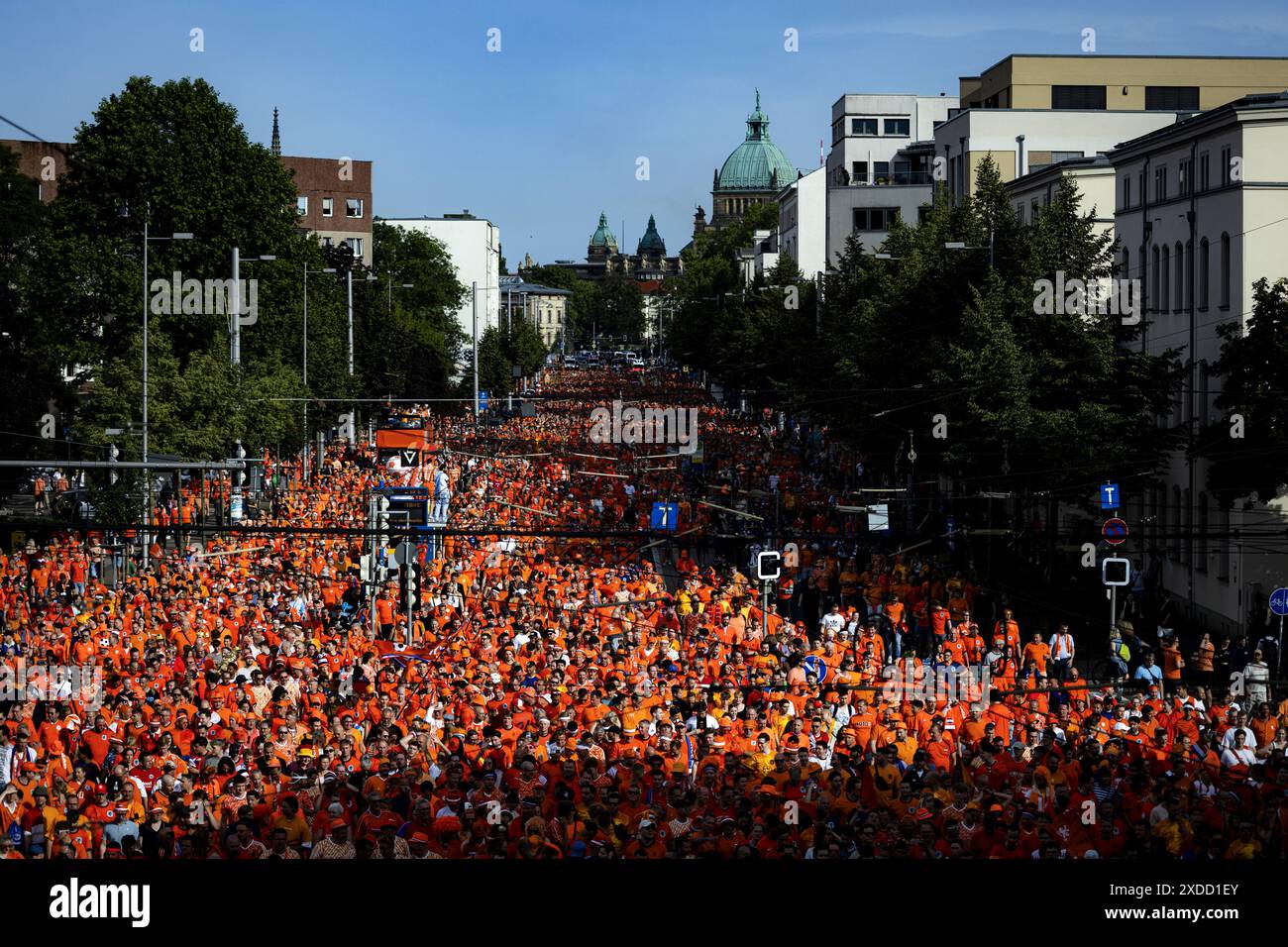 LEIPZIG - Dutch fans walk behind the Oranjebus during the fan walk to ...
