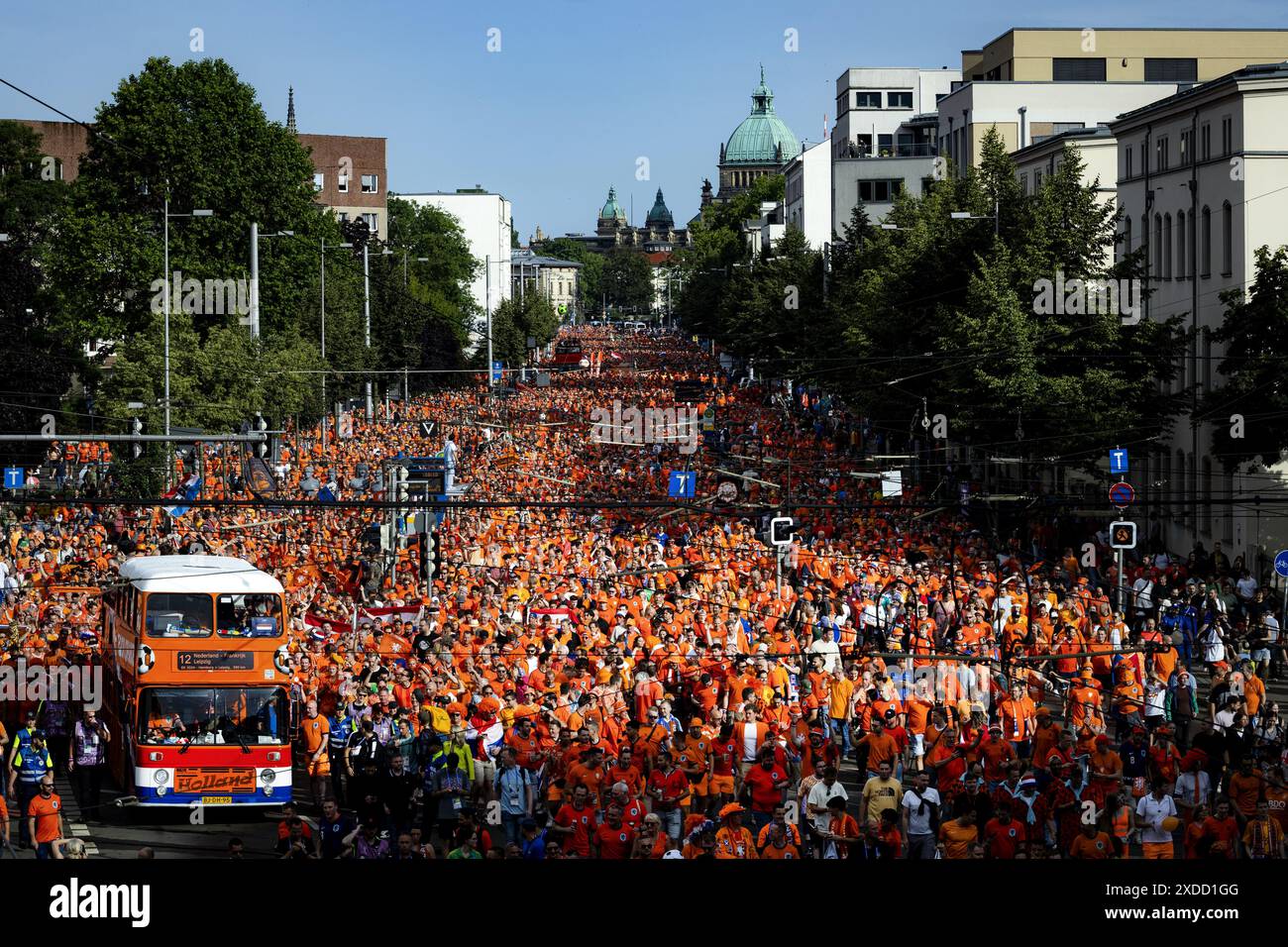 LEIPZIG - Dutch fans walk behind the Oranjebus during the fan walk to ...