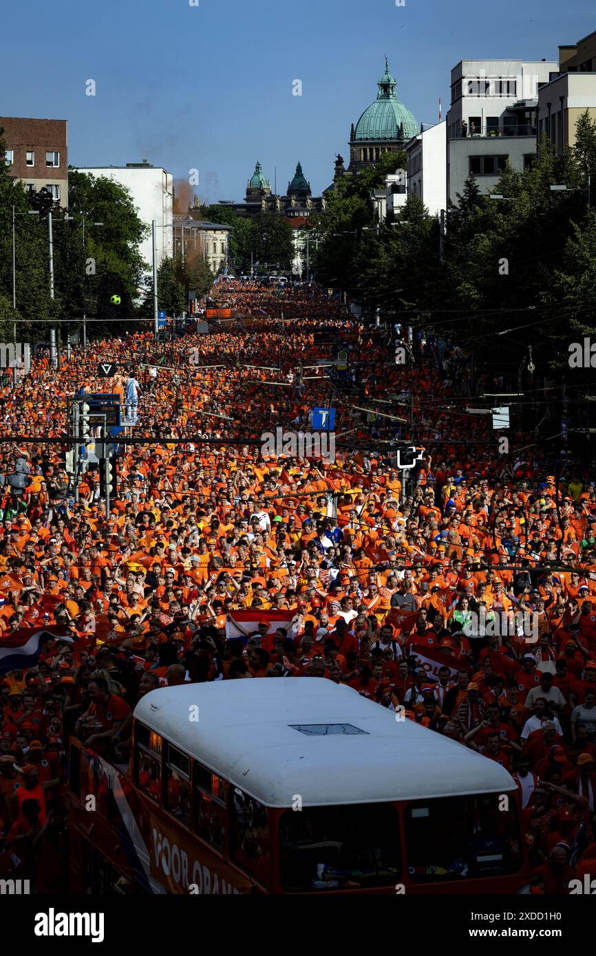 LEIPZIG - Dutch fans walk behind the Oranjebus during the fan walk to ...