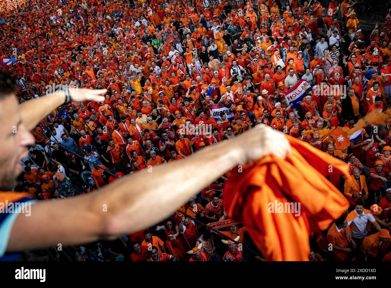 LEIPZIG - Dutch fans walk behind the Oranjebus during the fan walk to ...