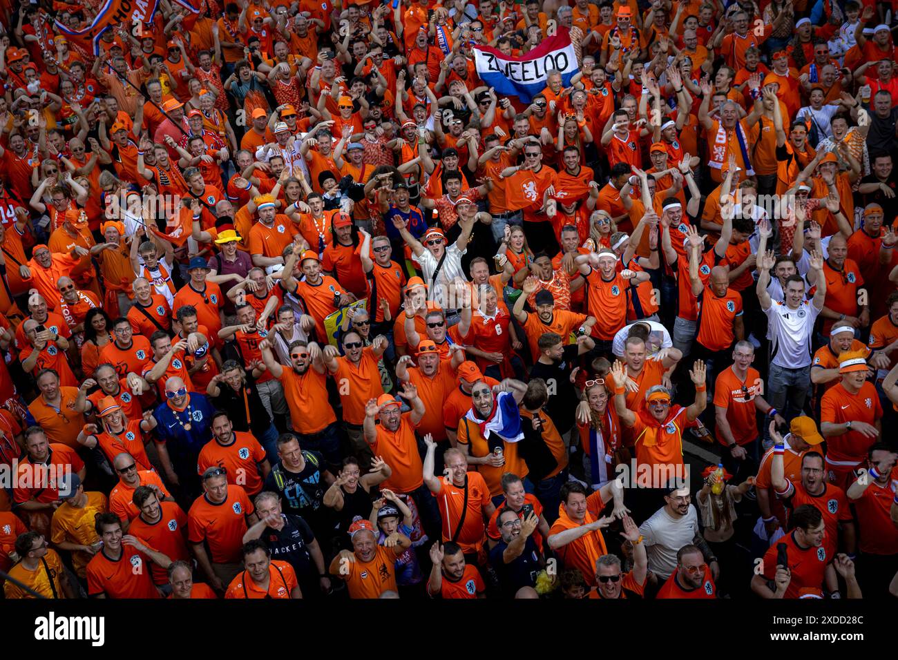 LEIPZIG - Dutch fans walk behind the Oranjebus during the fan walk to ...
