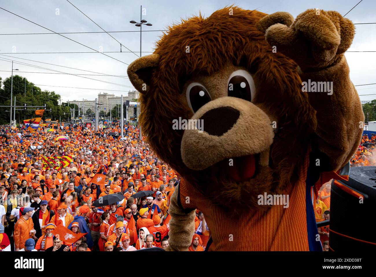 LEIPZIG - Dutch fans walk behind the Oranjebus during the fan walk to ...