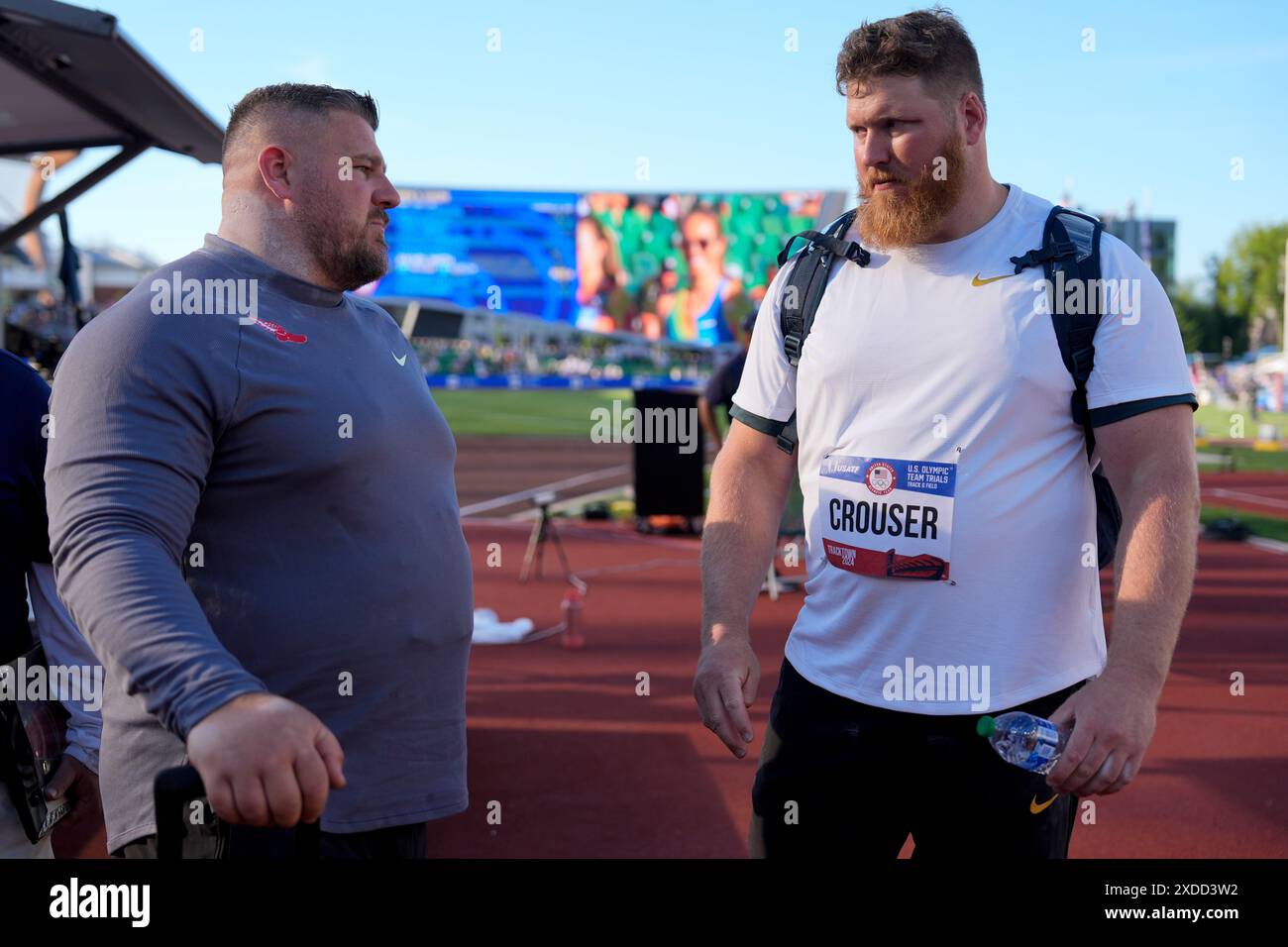 Ryan Crouser, right Joe Kovacs talk before the men's shot put during ...