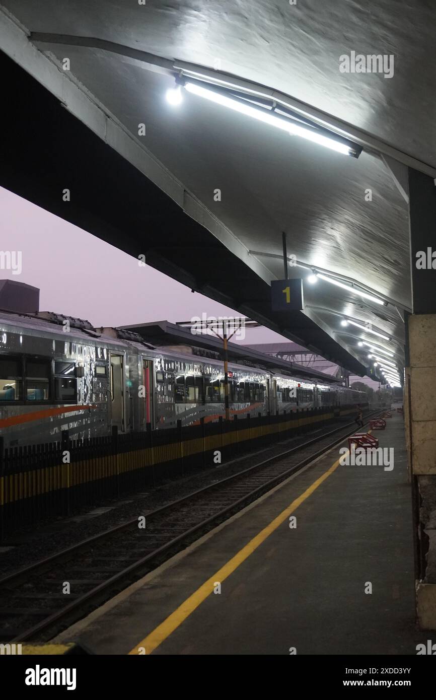 Sign of empty number one train line in the morning at an Indonesian ...