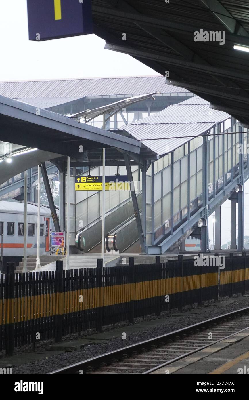 Sign of empty number one train line in the morning at an Indonesian ...