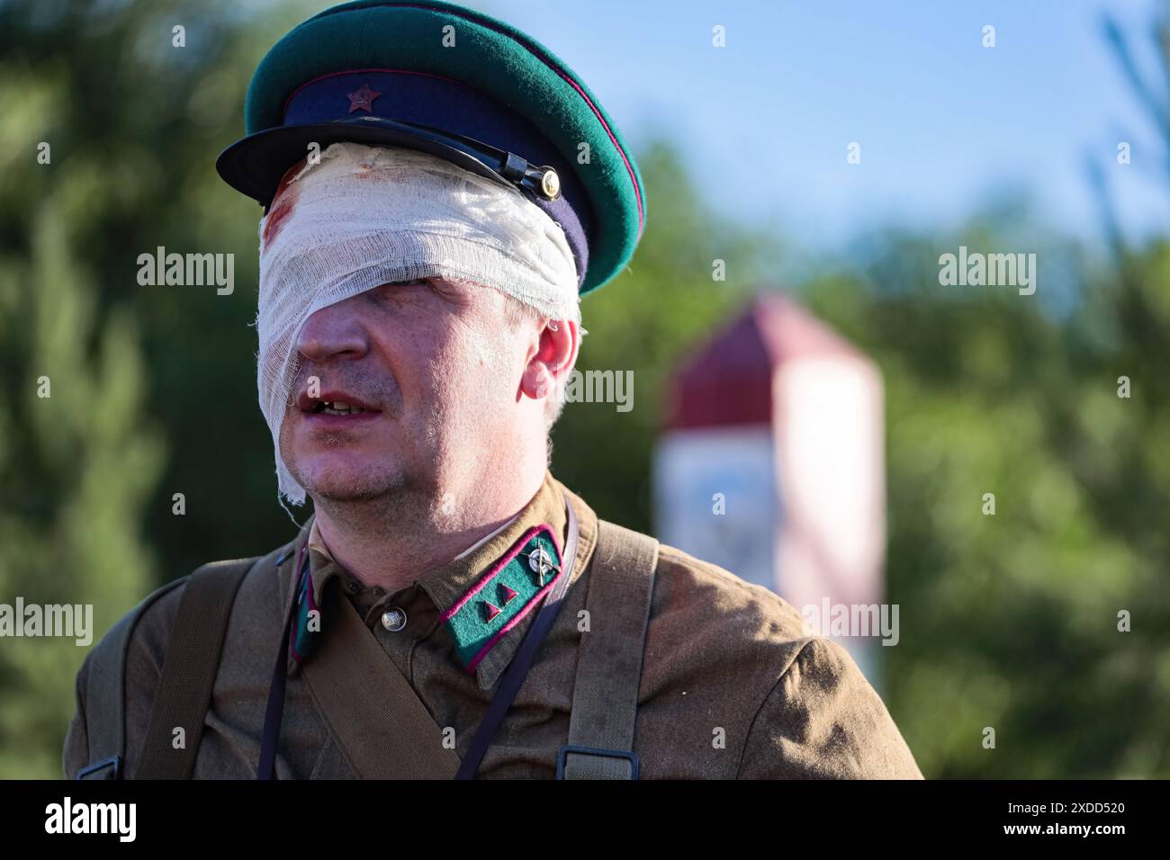 A participant in a military-historical reconstruction wearing a World ...