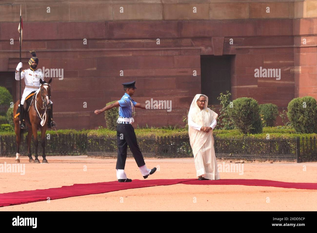 Bangladesh Prime Minister Sheikh Hasina inspects a joint military guard of honor upon her ...