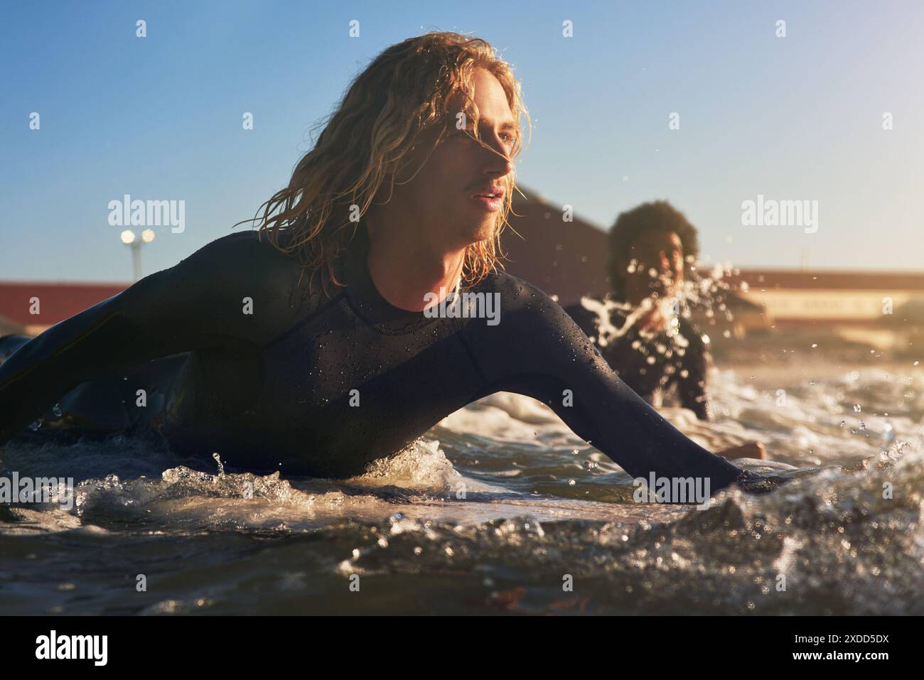 Man, swimming and surfboard with waves for ocean adventure, water ...