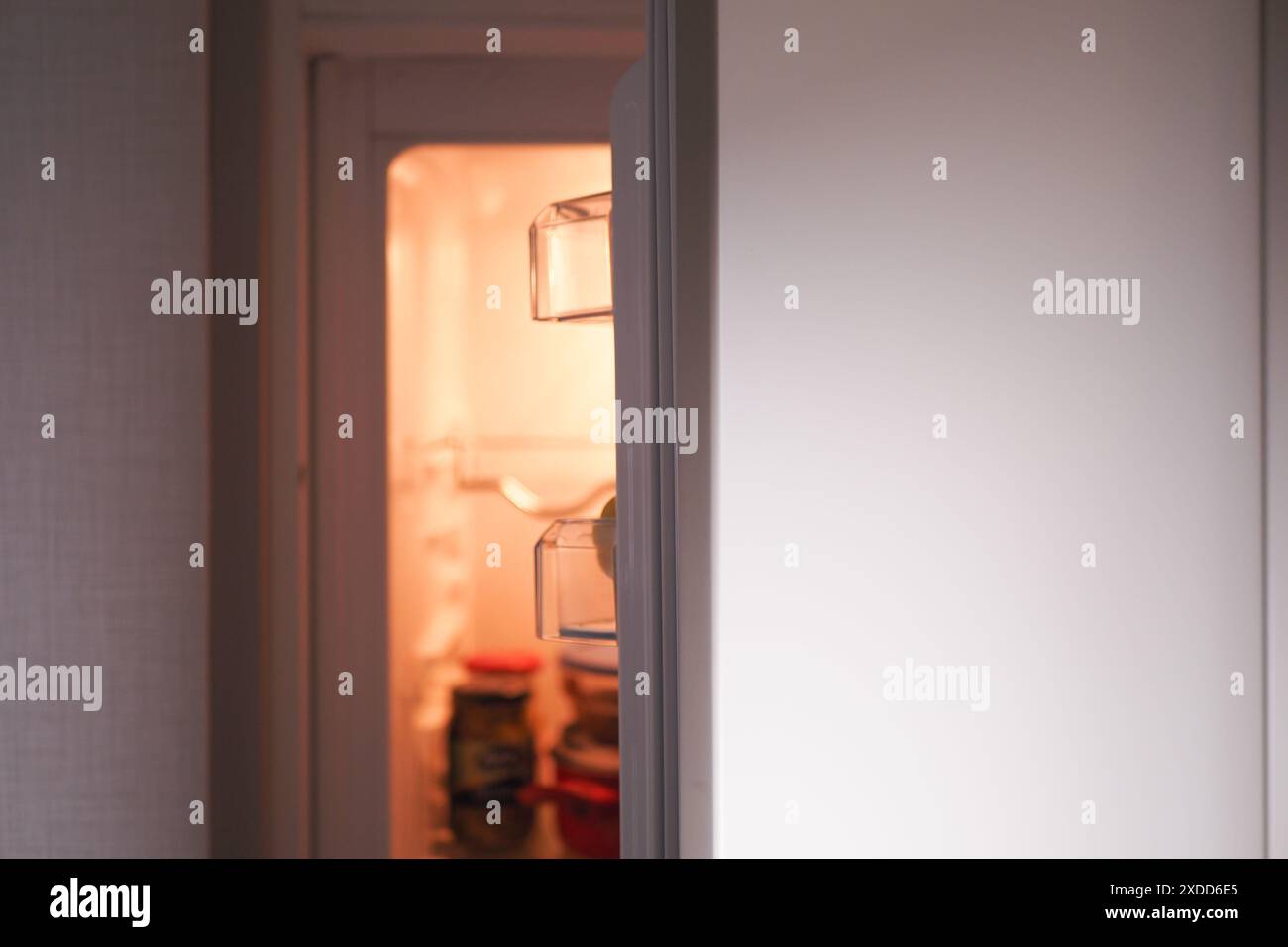 half open fridge with food and vegetables Stock Photo - Alamy