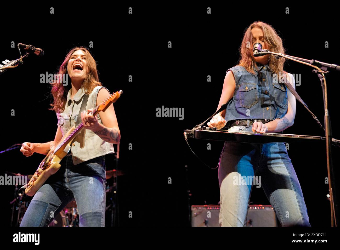 Rebecca Lovell, left, and Megan Lovell of Larkin Poe perform during the ...