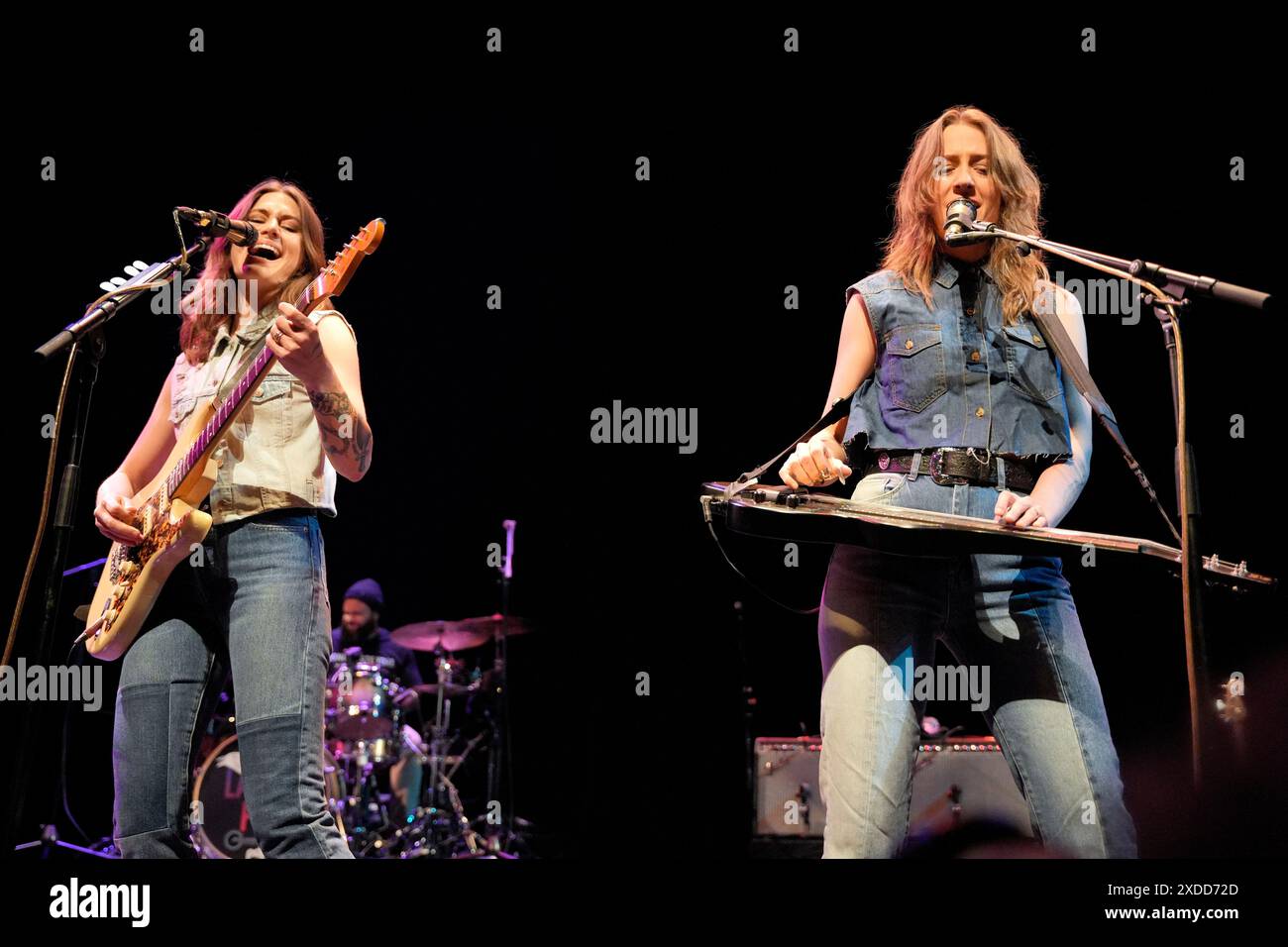 Rebecca Lovell, left, and Megan Lovell of Larkin Poe perform during the ...