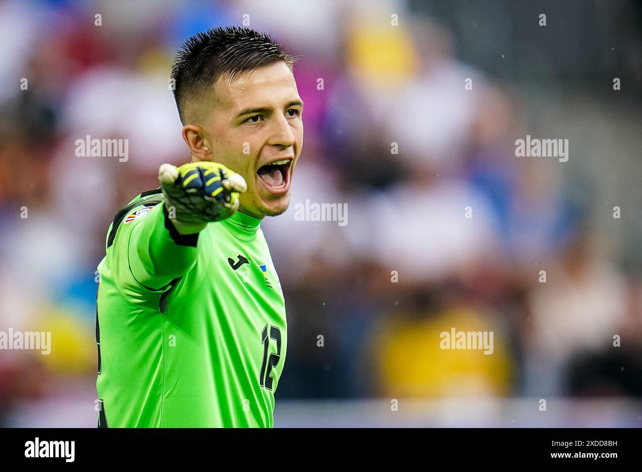 DUSSELDORF, GERMANY - JUNE 21: Ukraine goalkeeper Anatoliy Trubin gestures during the UEFA EURO ...