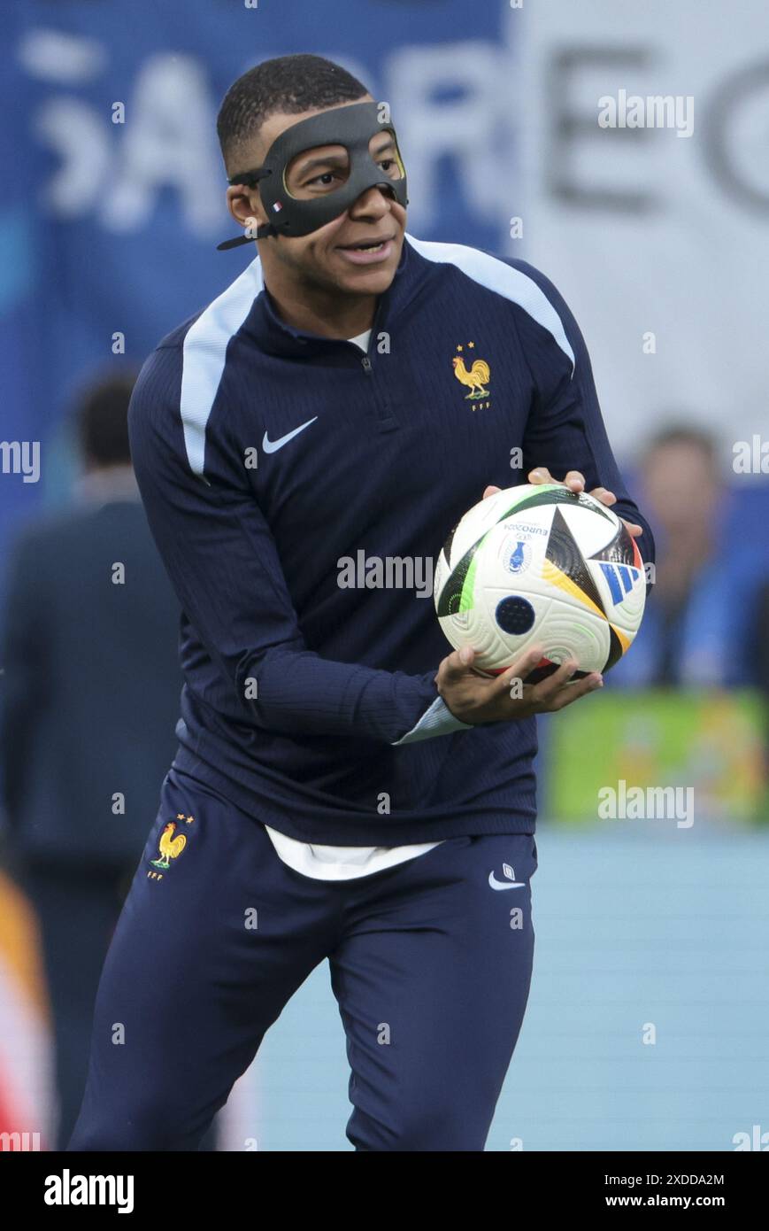 Kylian Mbappe of France wears a mask during the warm-pu before the UEFA ...