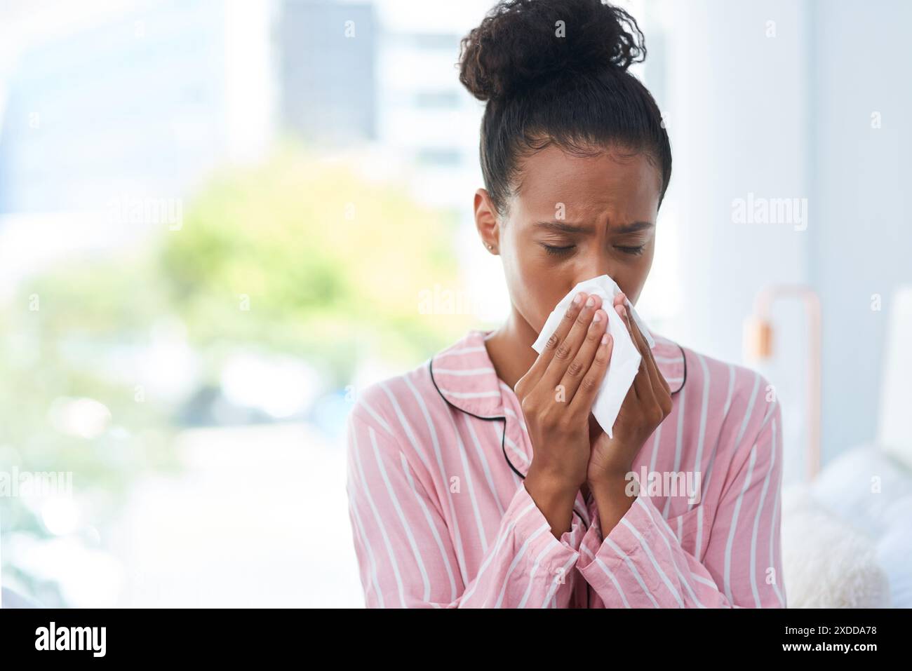 Sick black woman, tissue and blowing nose in home for allergy season ...
