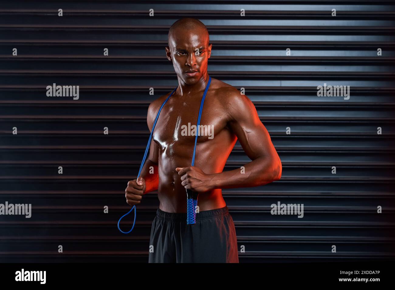 African man, muscle and skipping rope of athlete, fitness and healthy ...