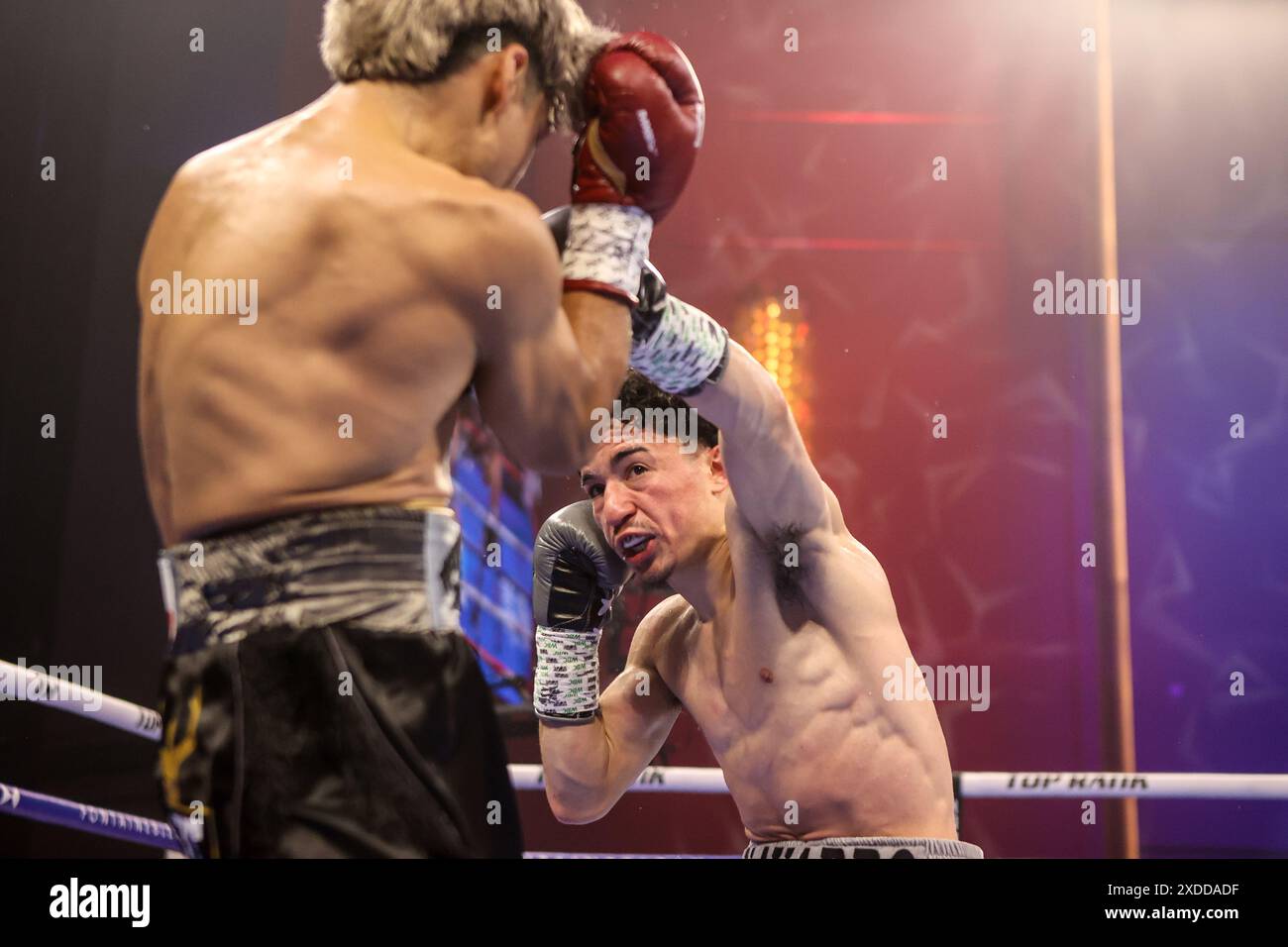 Las Vegas, NV, USA. 21st June, 2024. Steven Navarro (R) punches Juan ...