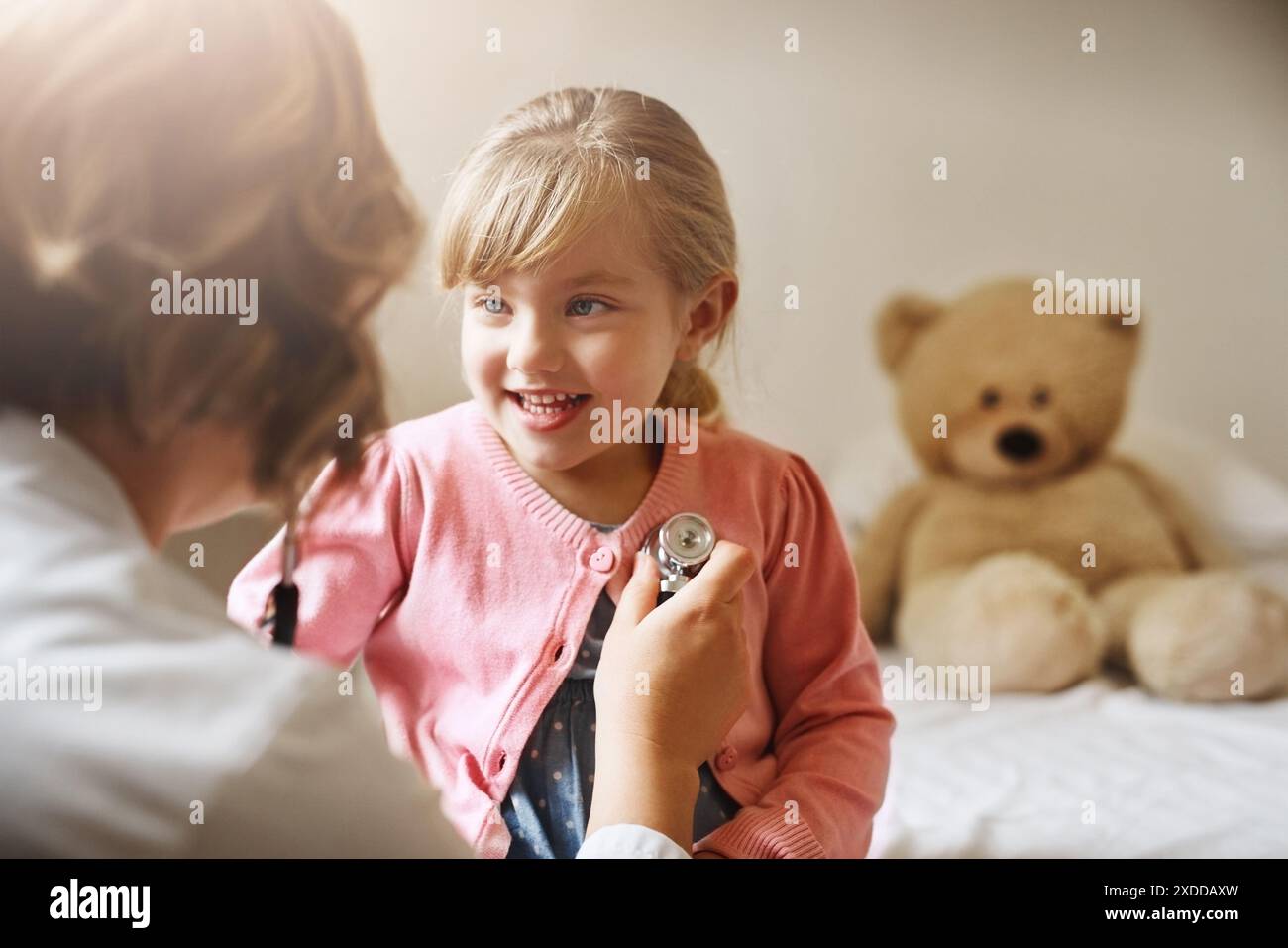 Doctor, child and stethoscope for clinic consultation, heartbeat ...