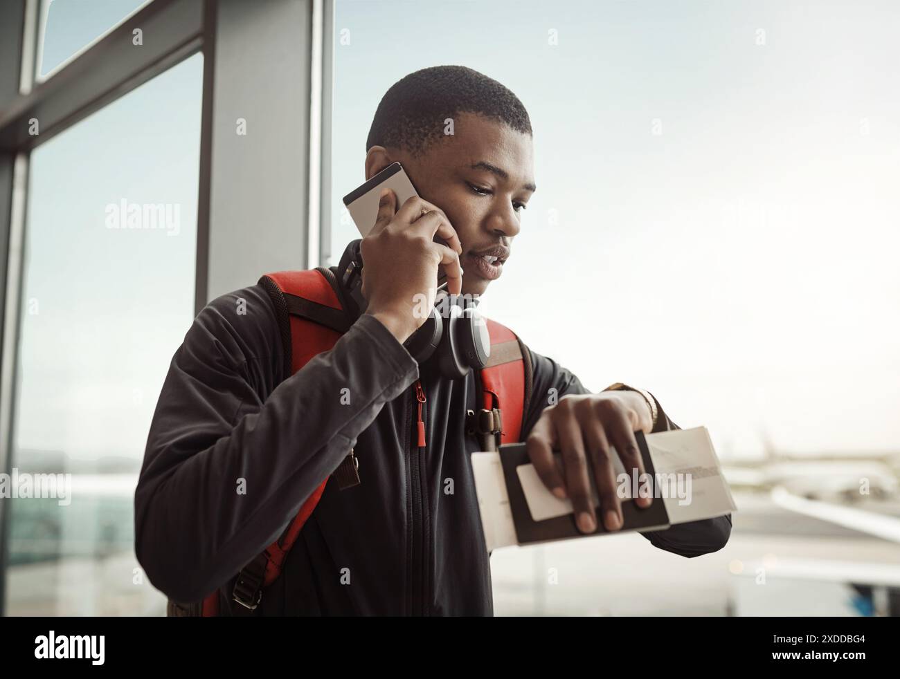 Travel, phone call and black man in airport, talking and explanation to ...