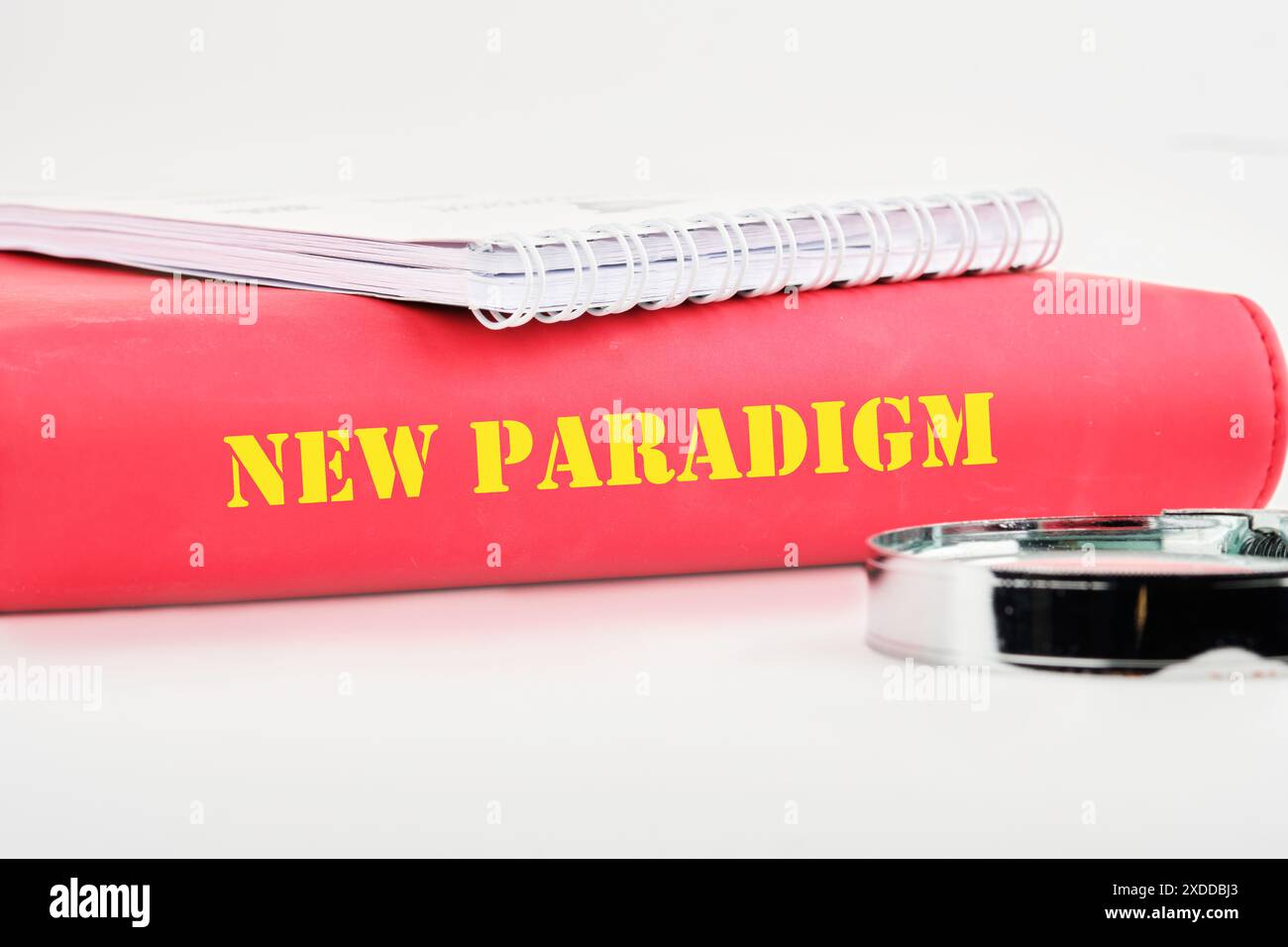 NEW PARADIGM word on the cover of the book on a white background Stock ...
