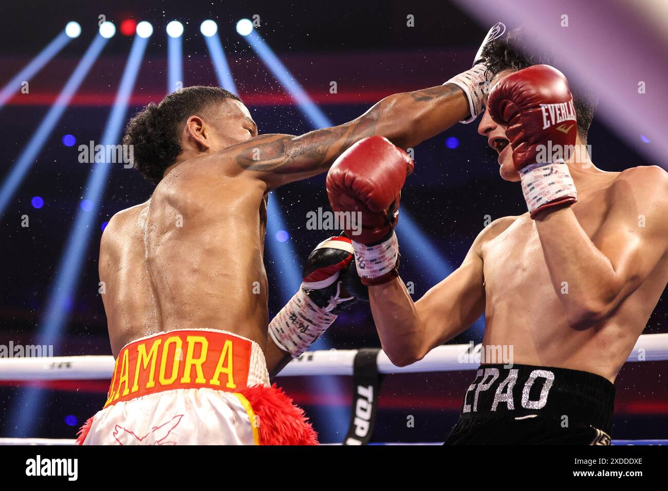 Las Vegas, NV, USA. 21st June, 2024. Junior Lightweight DJ Zamora (L) punches Jose Antonio Meza ...