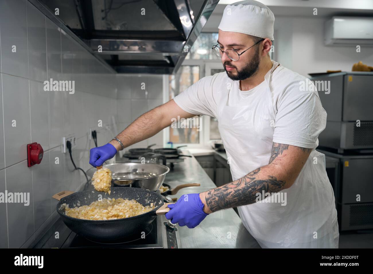 Person in modern kitchen prepares hi-res stock photography and images ...