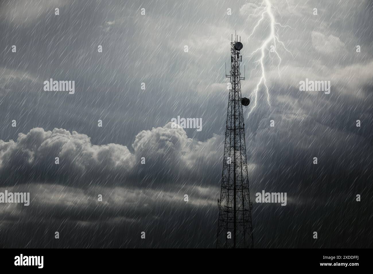 communication signal tower in heavy raining dark cloudy storm nature in ...