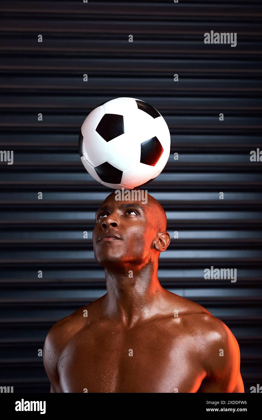 Soccer, ball and black man for balance with sports, physical fitness ...