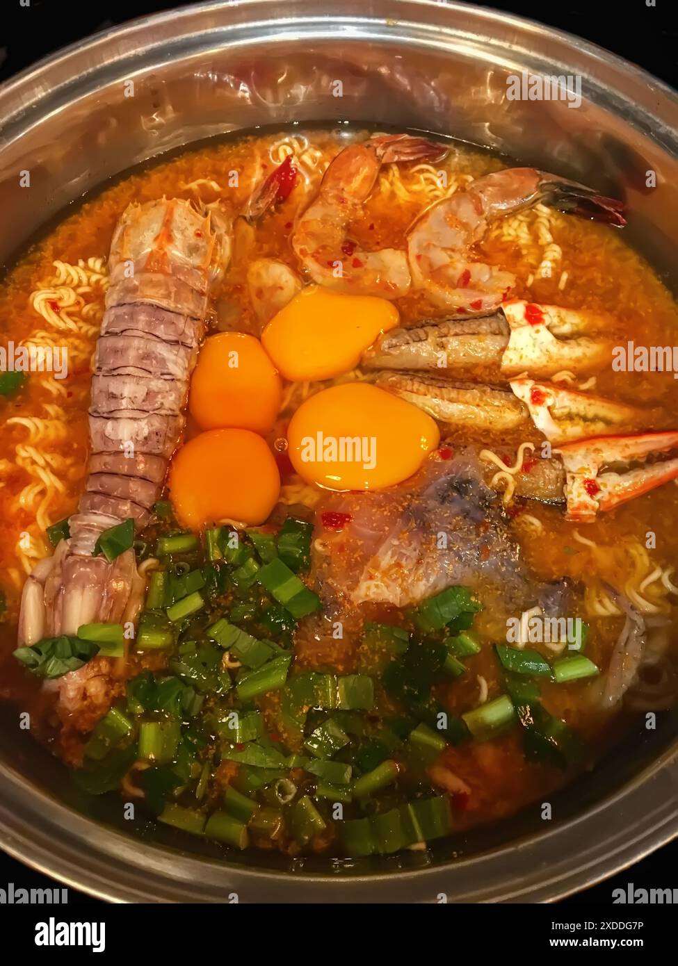 Experience the ultimate seafood ramen hotpot with fresh prawns, mantis shrimp, and rich, spicy ...