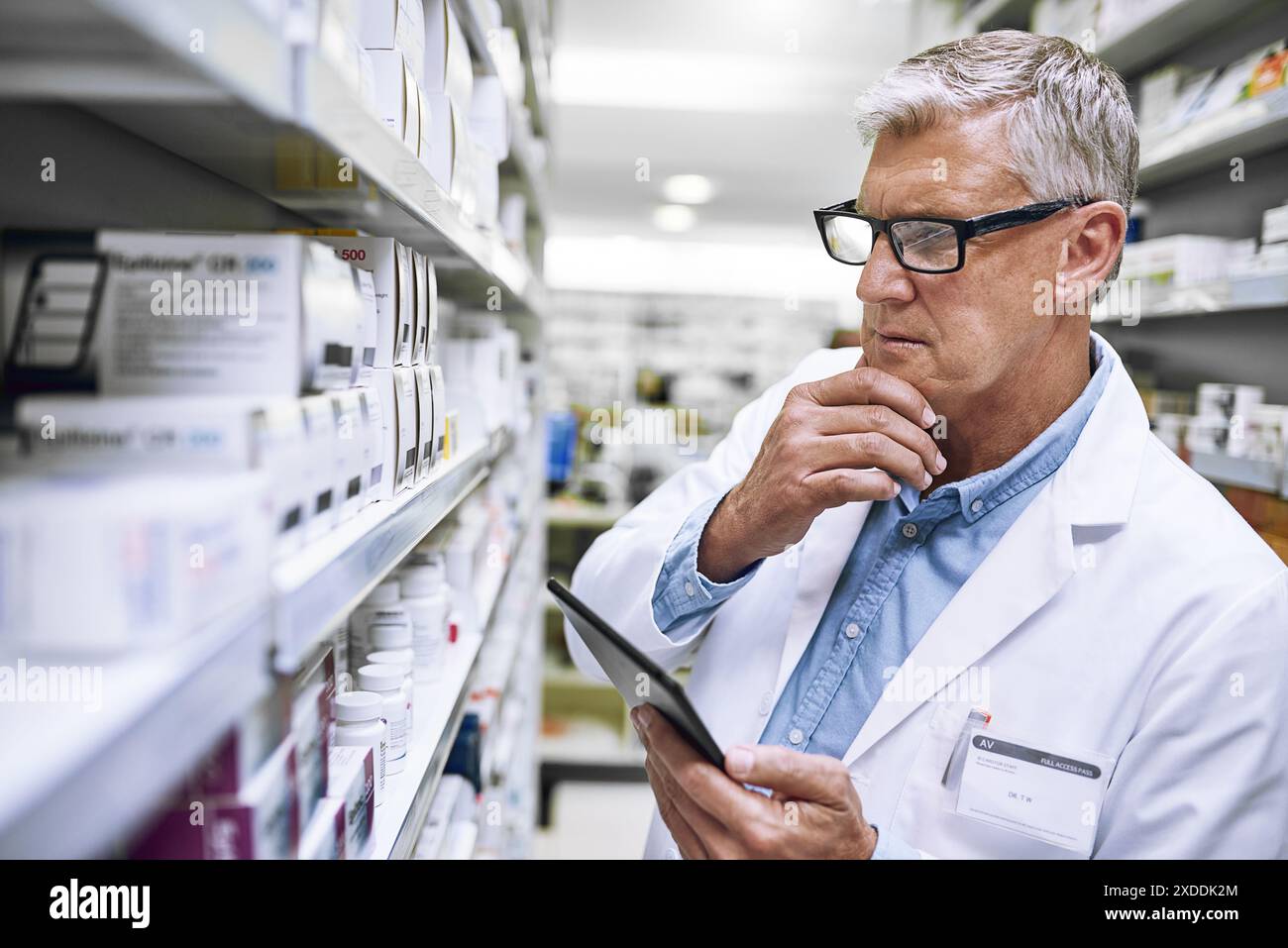 Pharmacy, tablet and man or doctor by shelf with stock inventory ...
