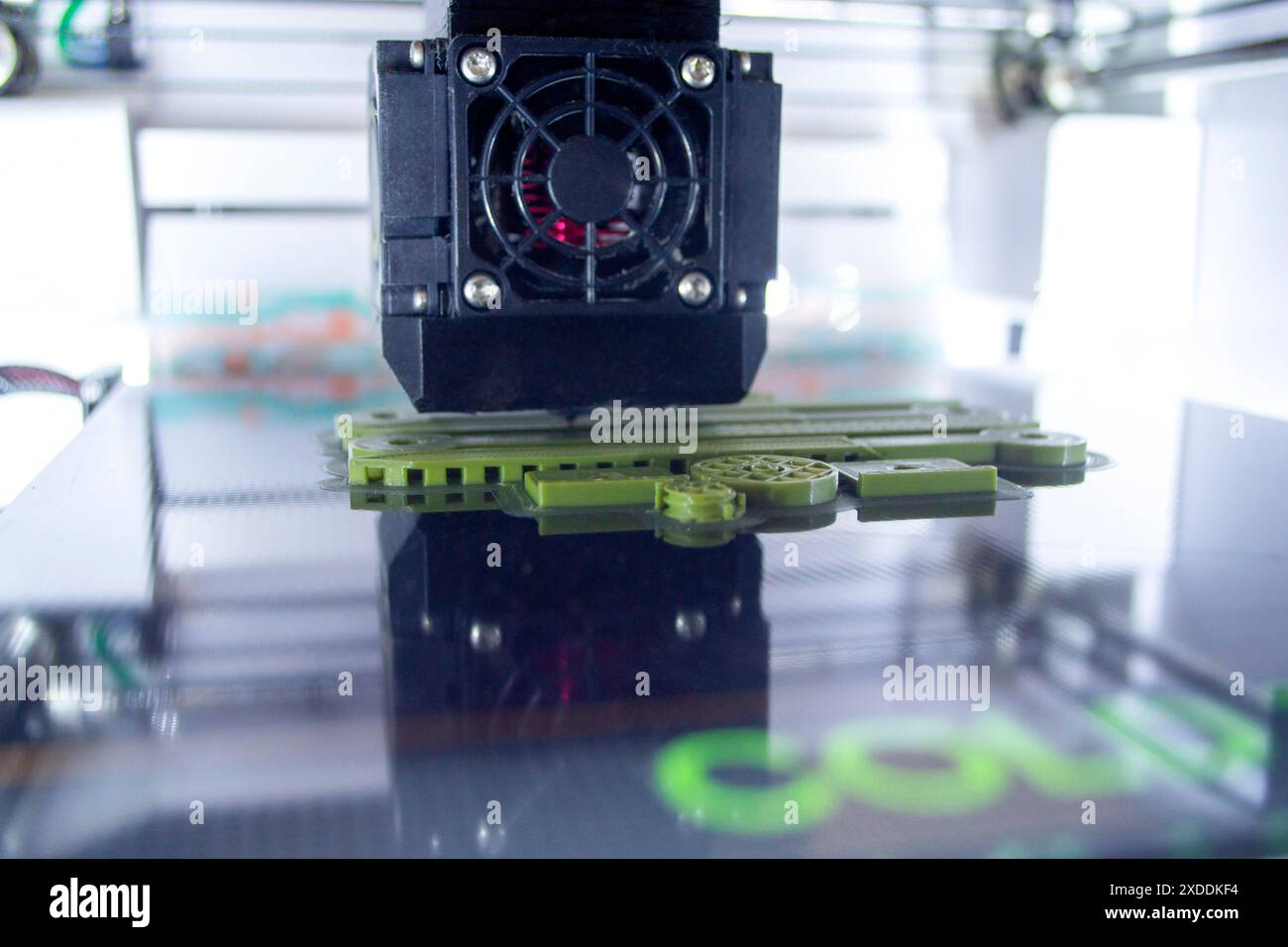 3D printer close up. A working 3D printer in process of printing object ...