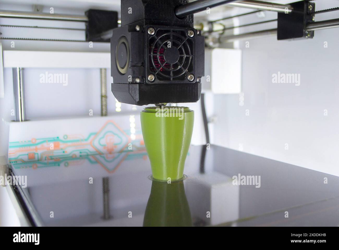 3D printer close up. A working 3D printer in process of printing object ...