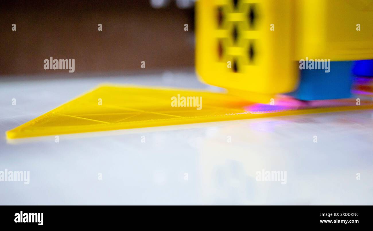 3D printer close up. A working 3D printer in process of printing object ...