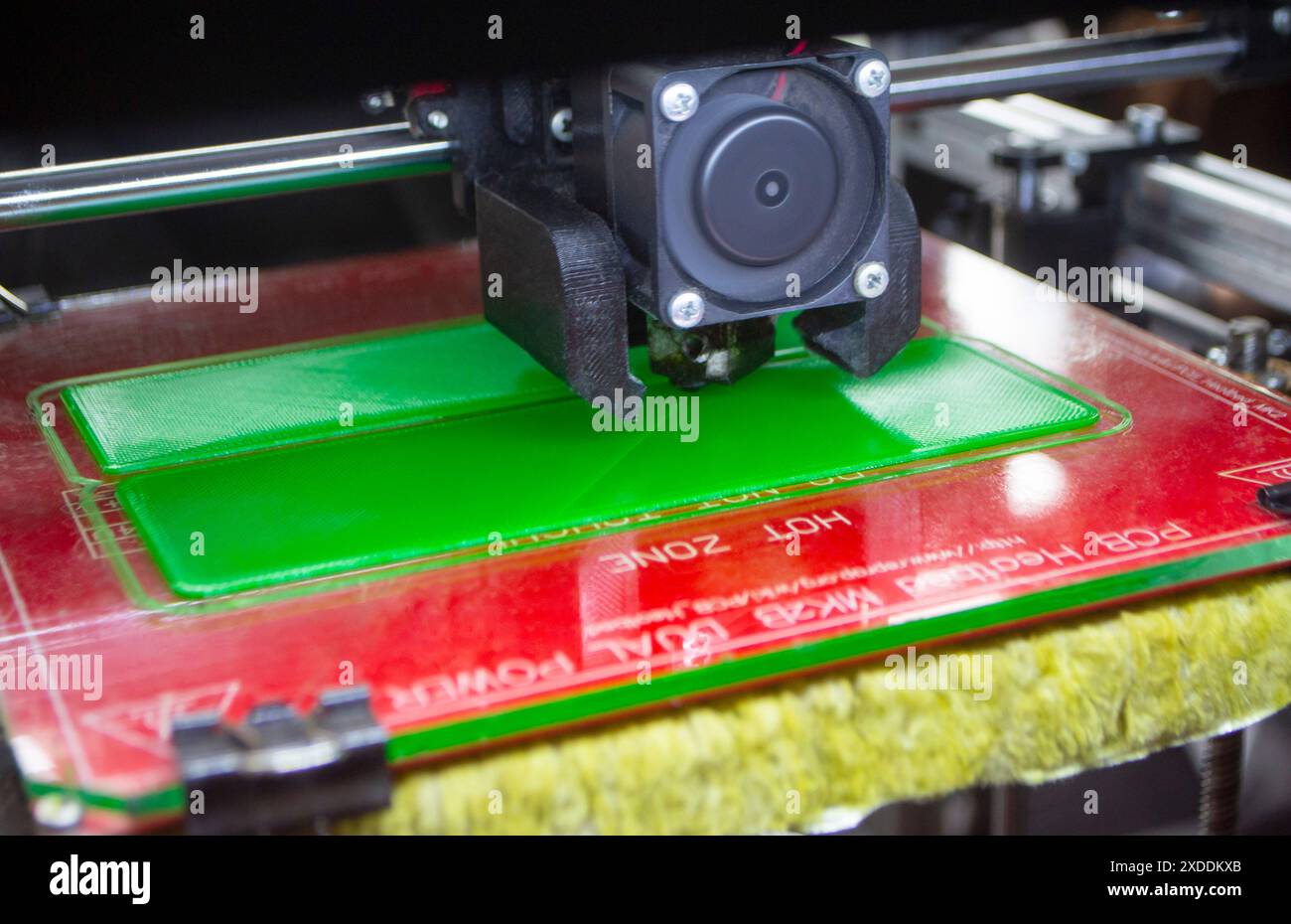 3D printer close up. A working 3D printer in process of printing object ...