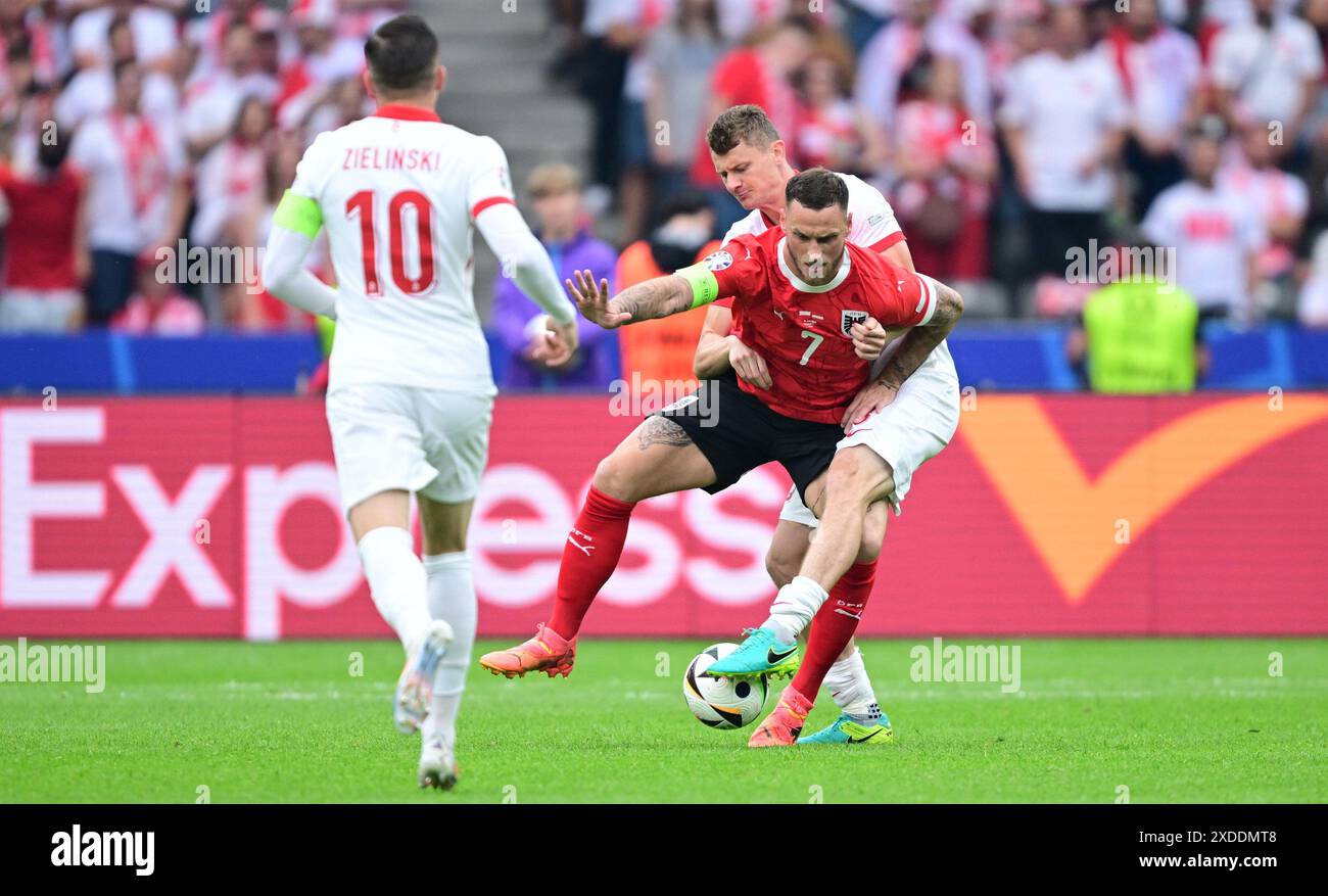 v.l. Pawel Dawidowicz, Marko Arnautovic (Oesterreich)Berlin, 21.06.2024 ...