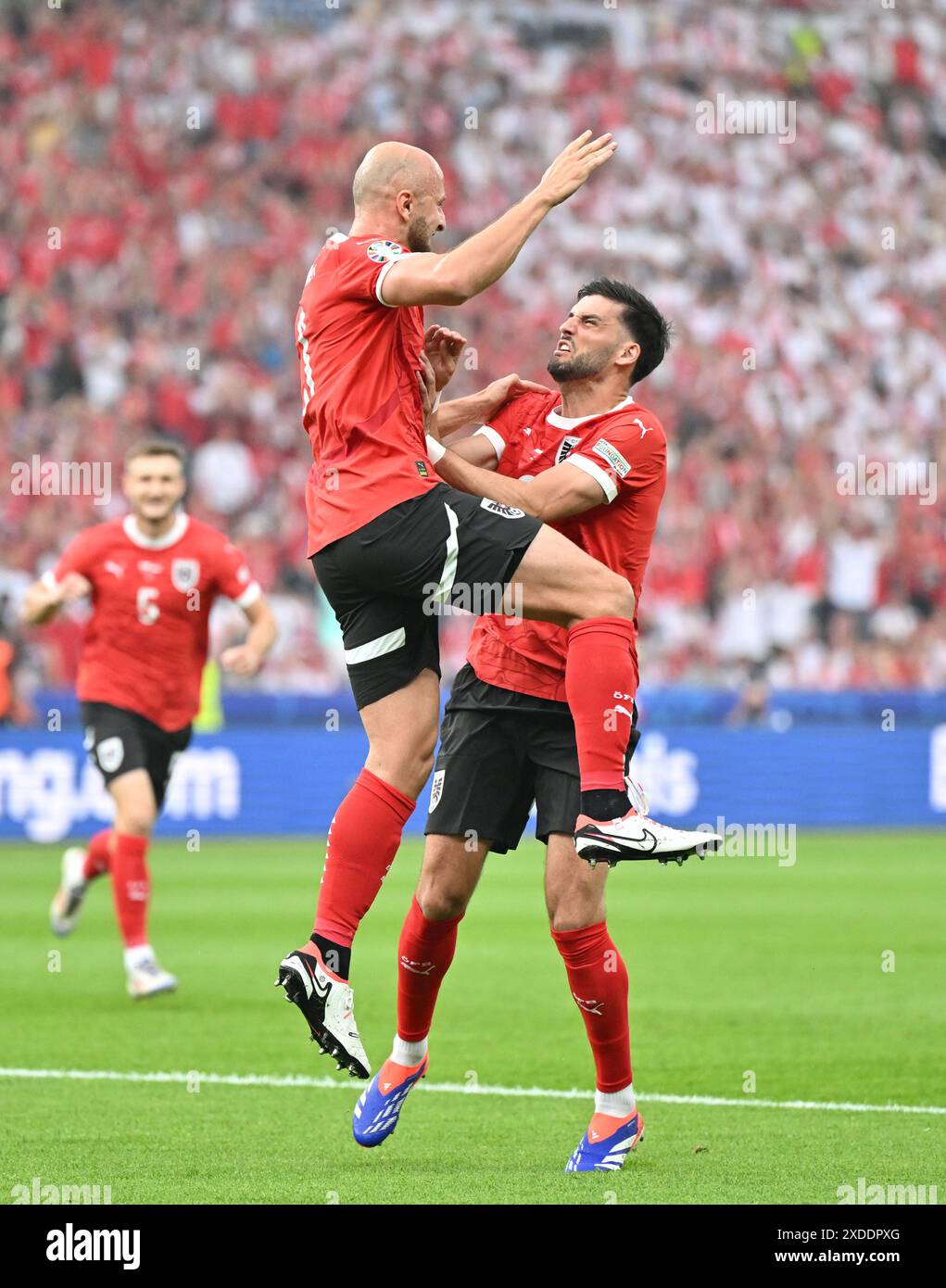 Berlin, Germany. 21st June, 2024. Gernot Trauner (Top) of Austria ...