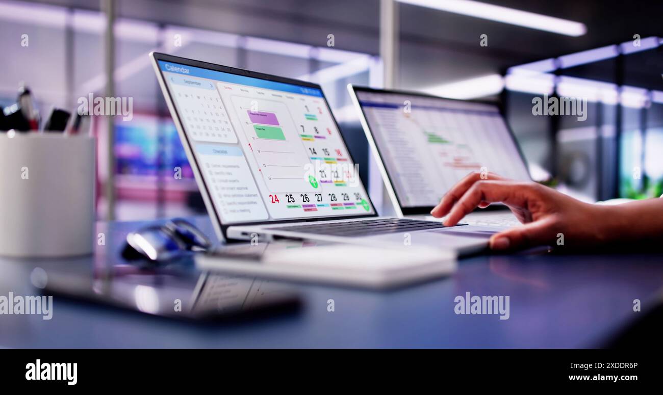 Managing Tasks and Schedules with Gantt Calendar on Laptop Screen ...