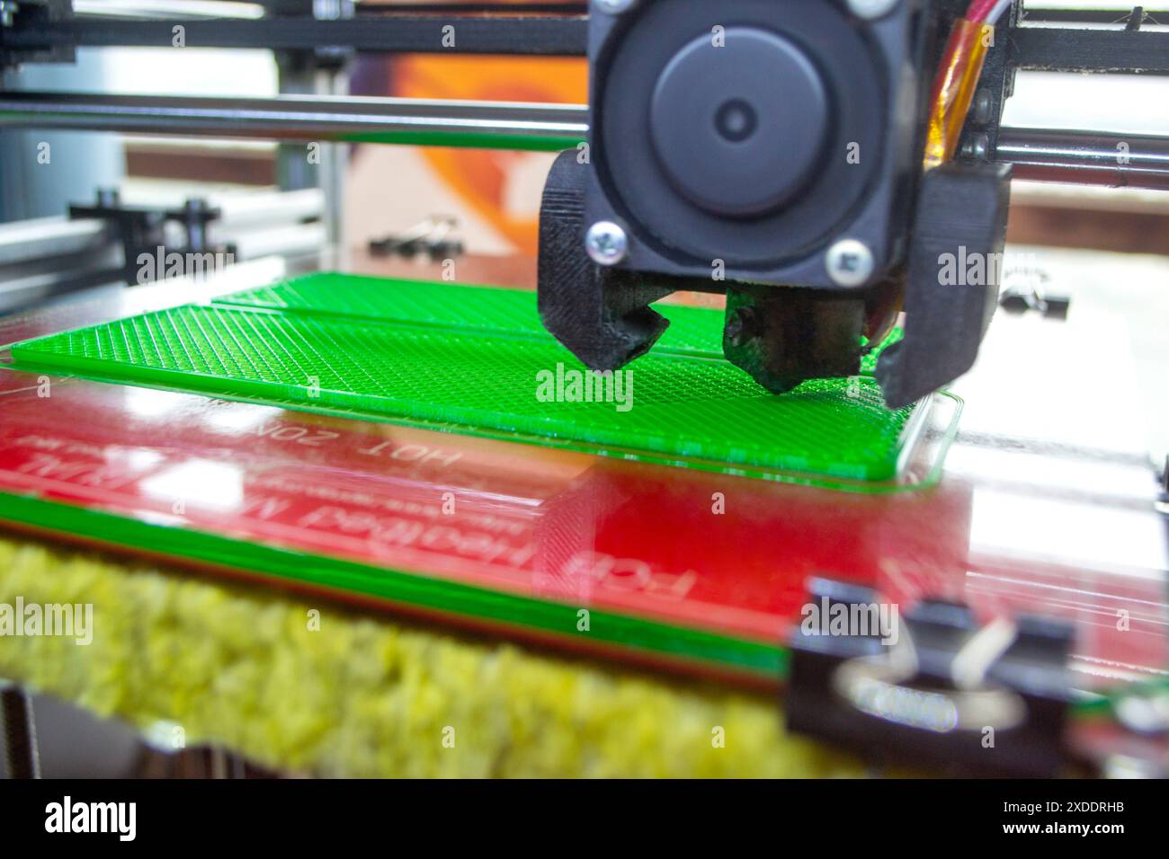 3D printer close up. A working 3D printer in process of printing object ...