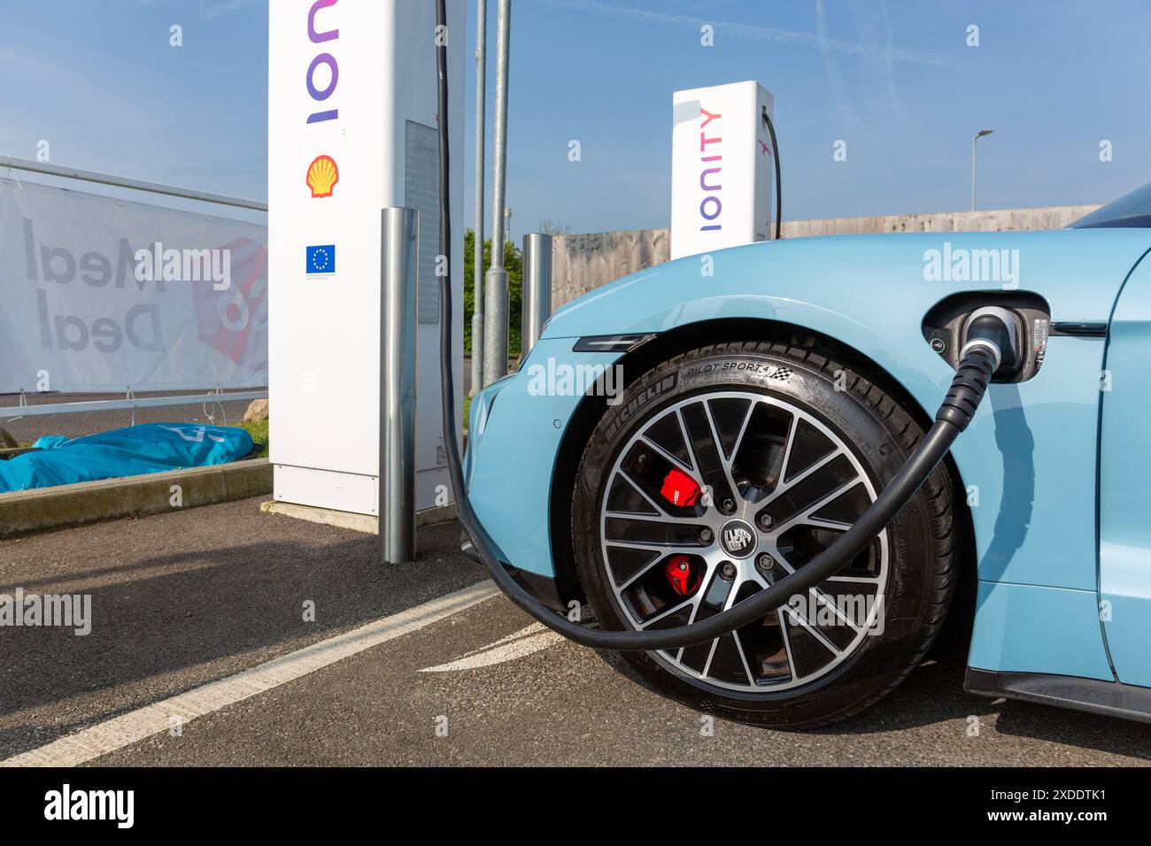 Porsche Taycan charging at an Ionity EV Charging point Stock Photo - Alamy