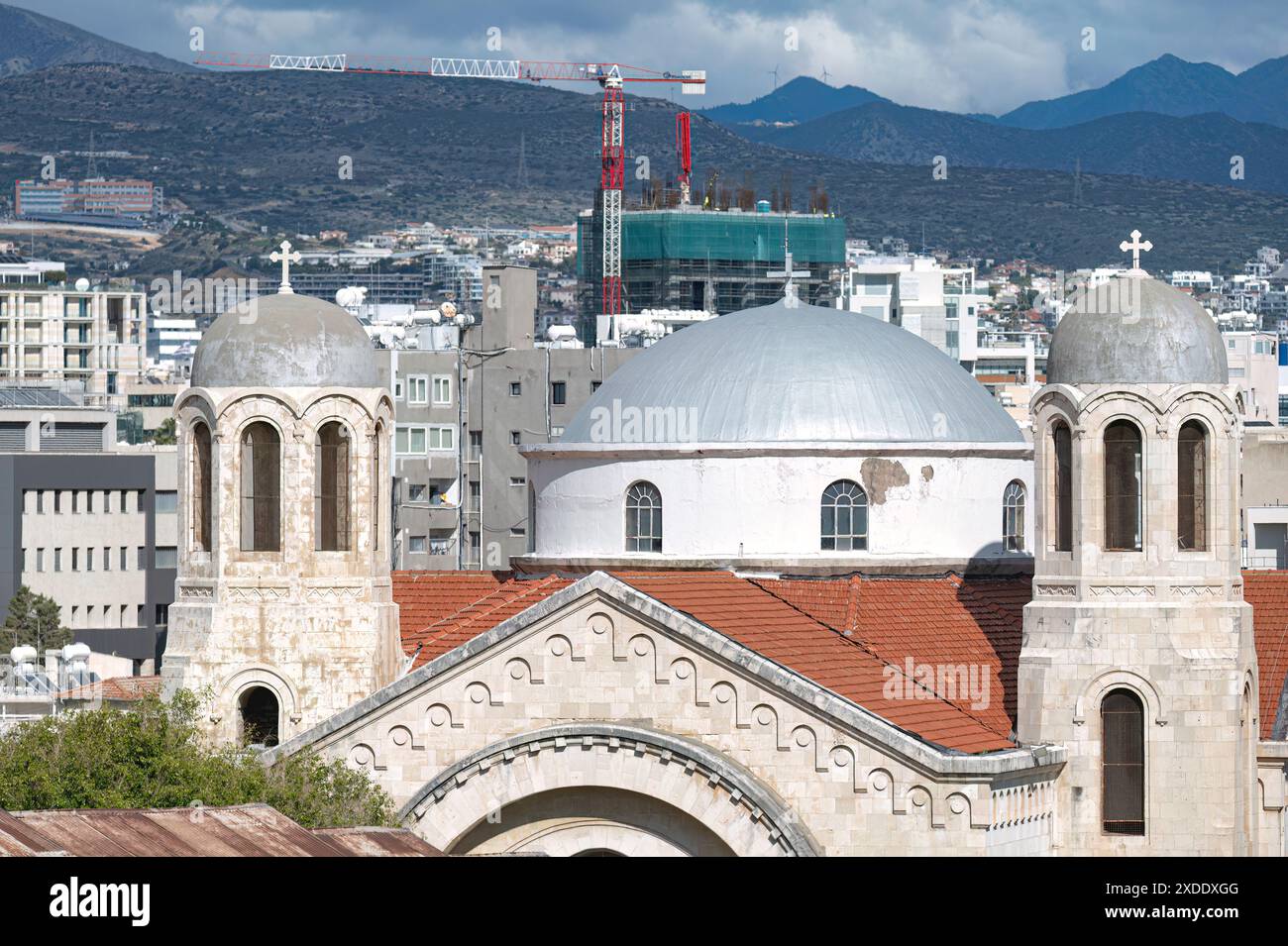 Holy Trinity church standing tall above the developing city skyline of ...