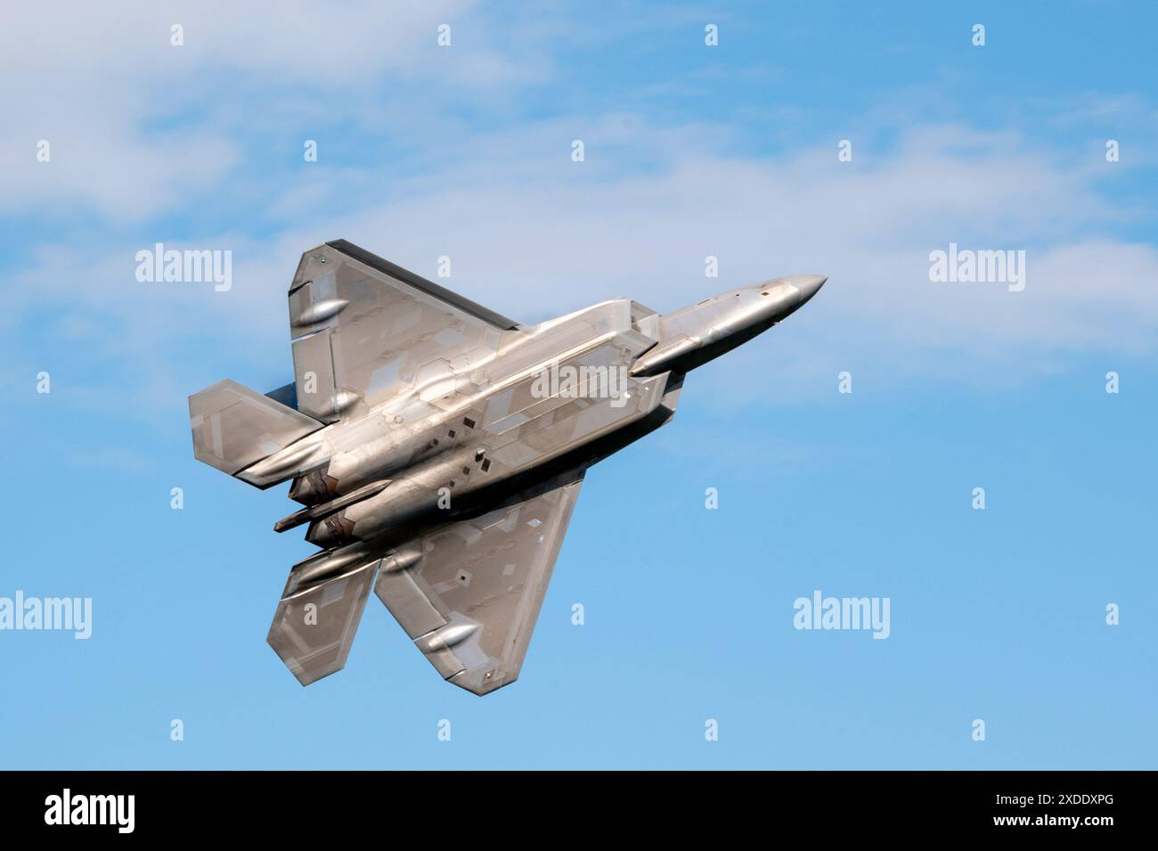 A U.S. Air Force F-22 Raptor assigned to the 3rd Wing flies above Joint ...