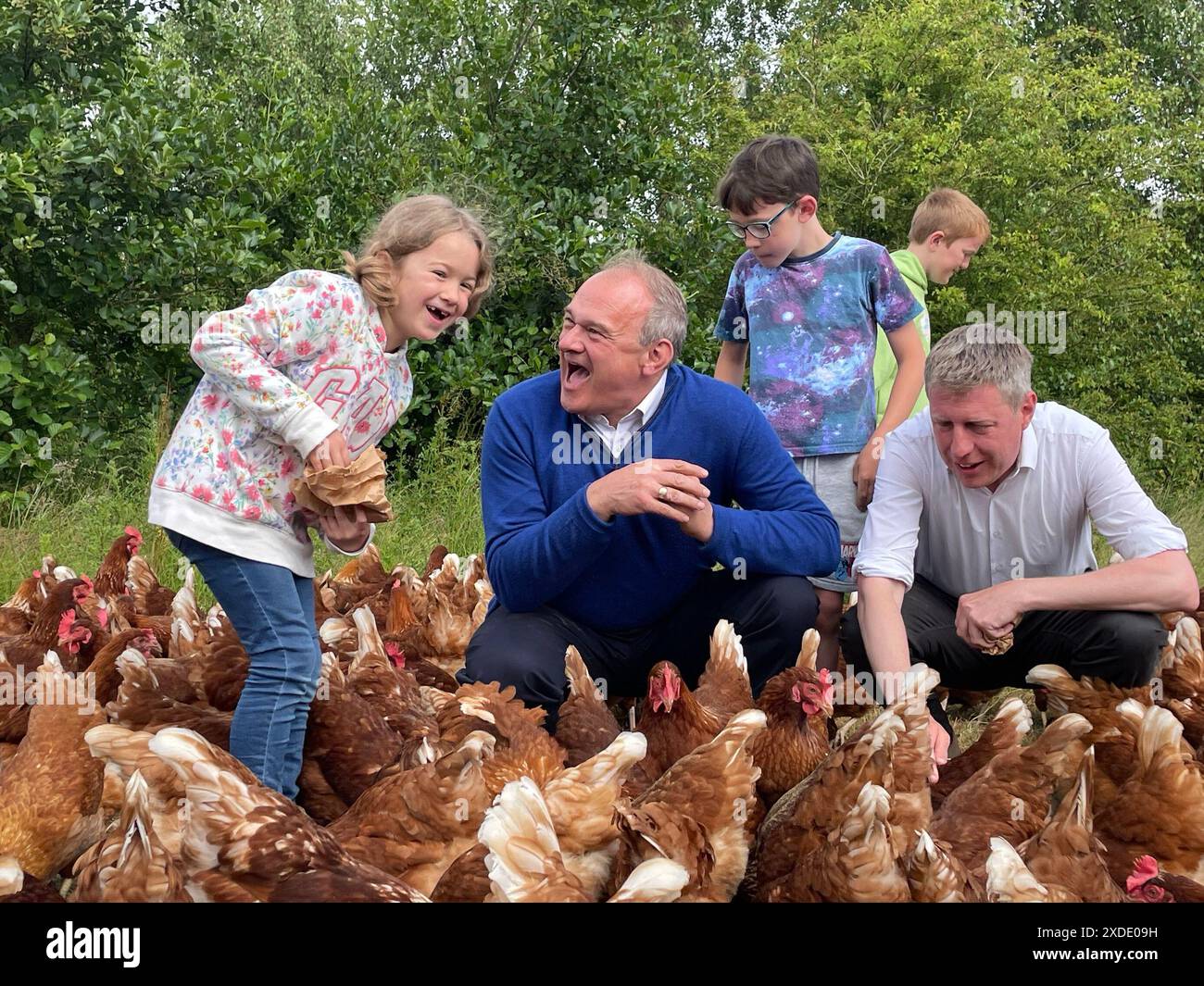 Liberal Democrats leader Sir Ed Davey (centre) during a visit to the ...