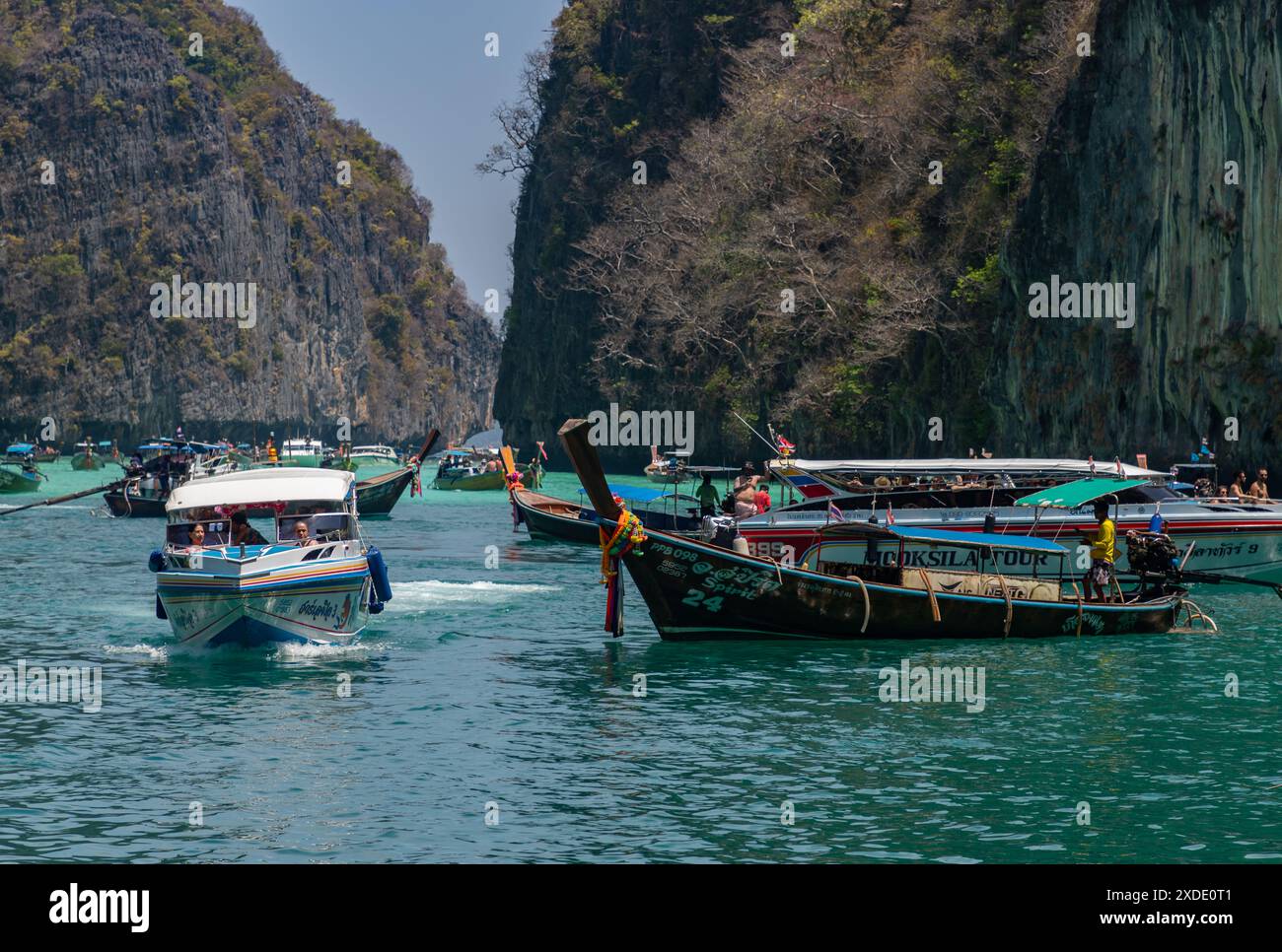 A picture of boat tours on Pi Leh Bay, at the Ko Phi Phi Lee Island ...