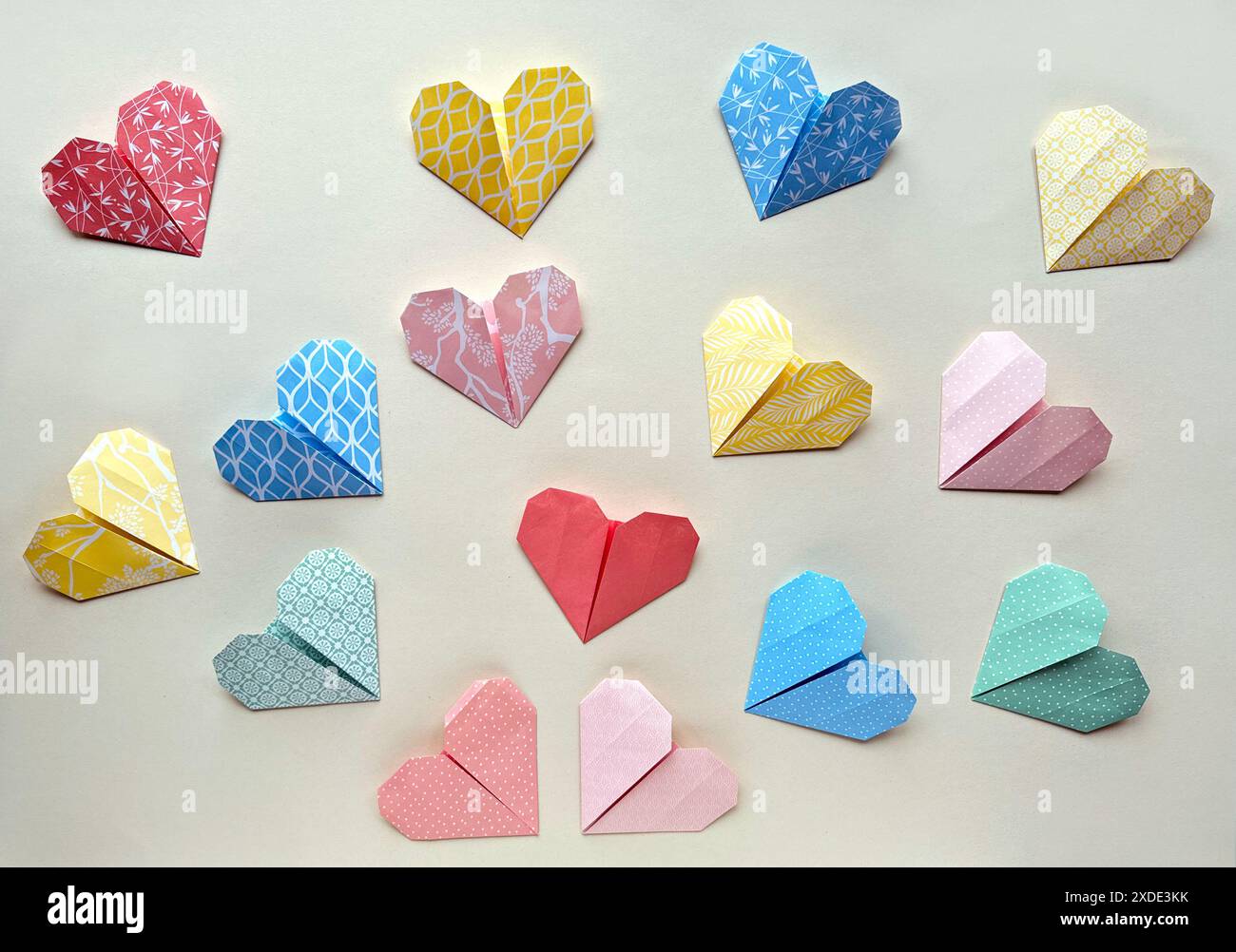 Colorful Origami Hearts Pattern on Light Background for Creative ...