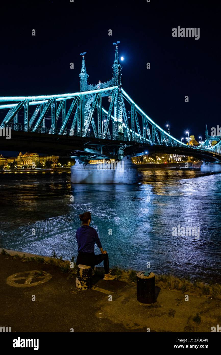 The top of the four masts of the Liberty Bridge are decorated with ...