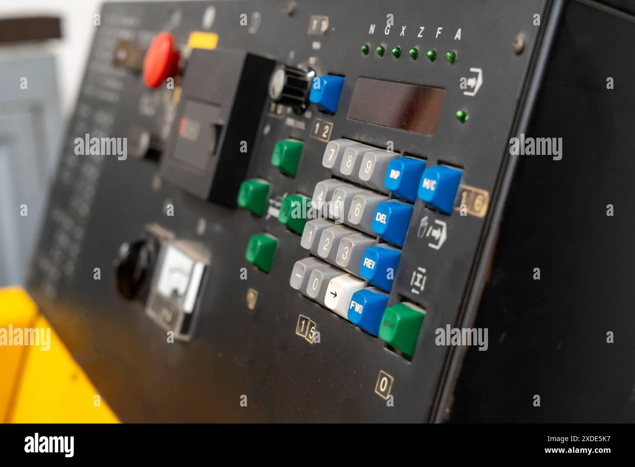 Buttons of the control panel of an old CNC machine Stock Photo - Alamy