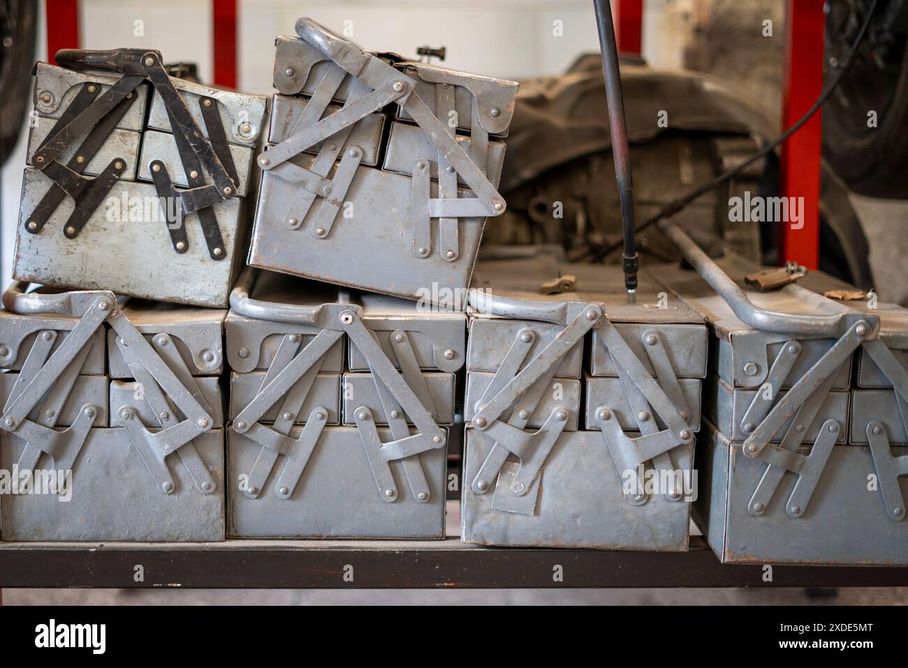 Old metal colored tool boxes stacked on top of each other Stock Photo ...