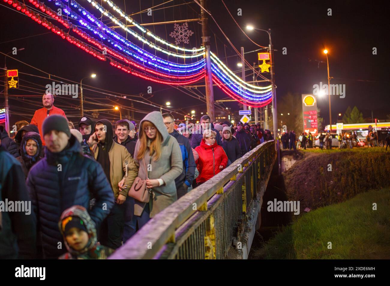 crowd of Russian people crossing the bridge after watching fireworks at ...