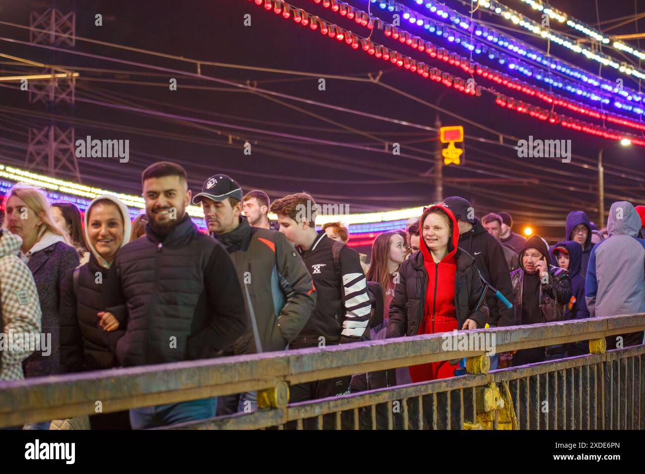 crowd of Russian people crossing the bridge after watching fireworks at ...